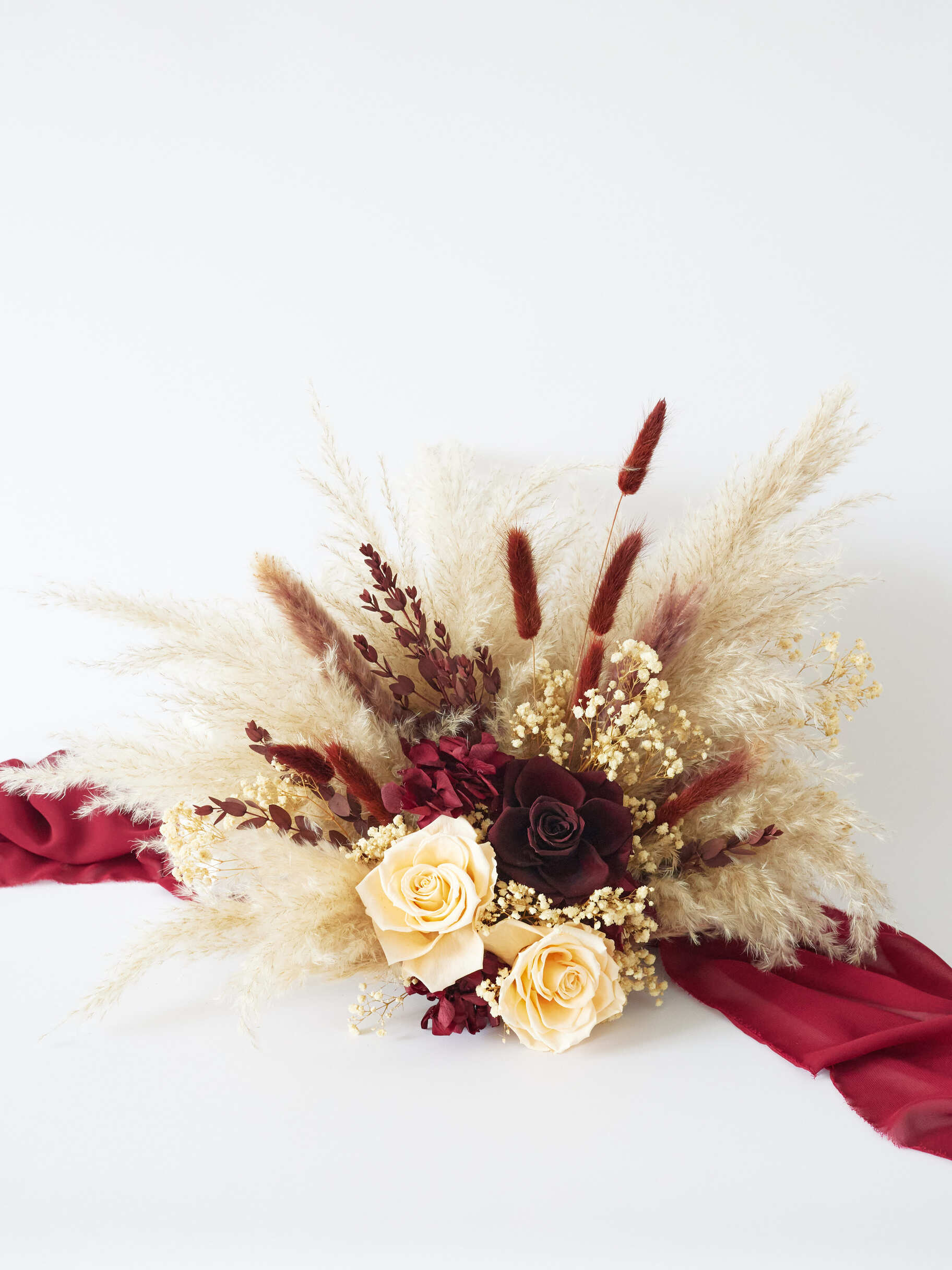 Centerpiece with cream, marsala roses, beige pampas - DecorFlowerBar ...